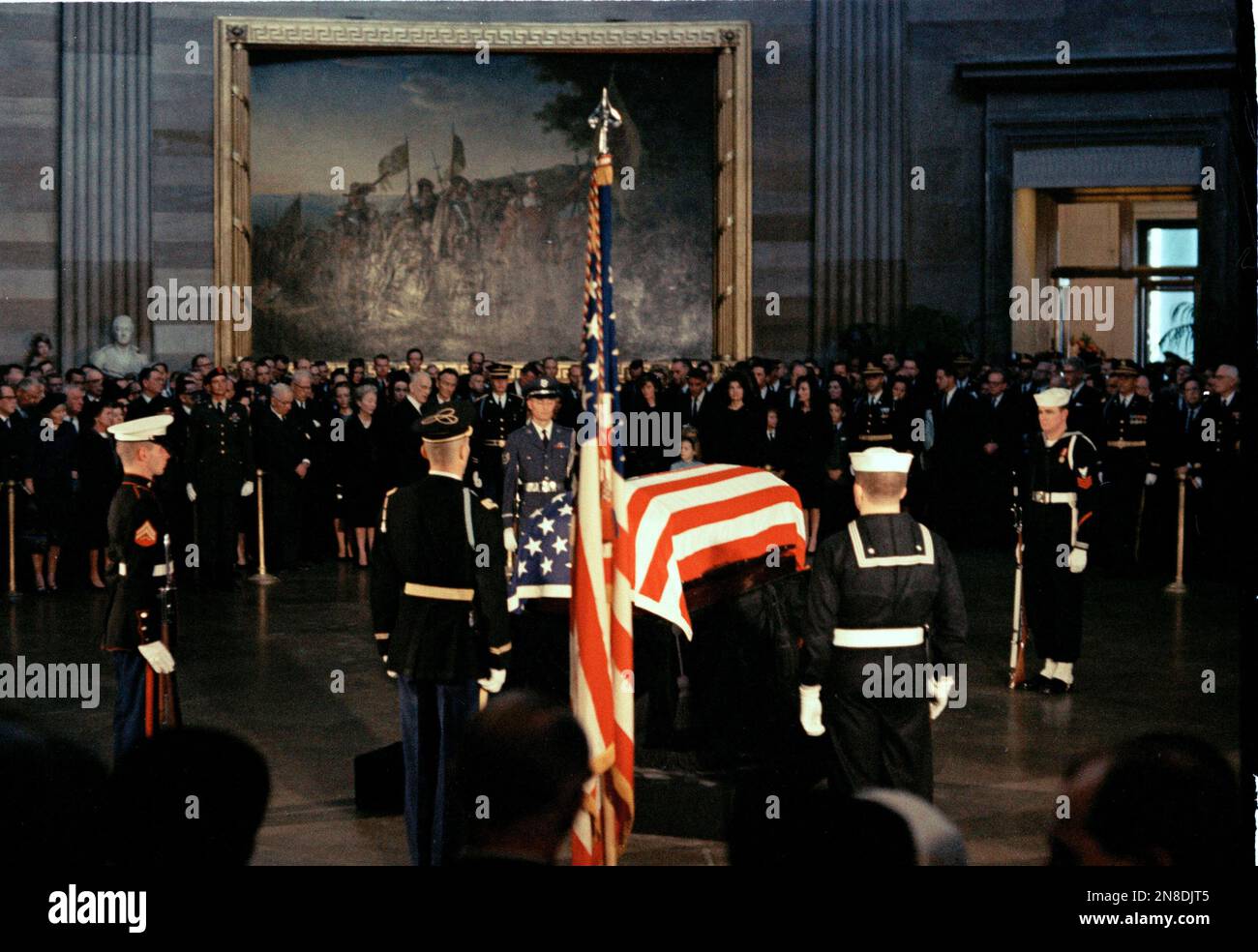 The flag-draped casket of President John F. Kennedy lies in state in ...