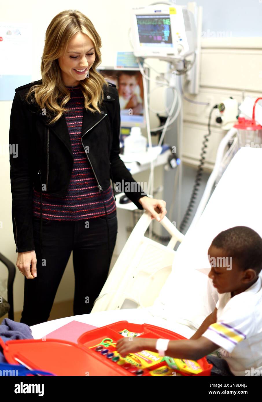 Stacy Keibler delivered The Art of Elysium Holiday Art Kits provided by ...