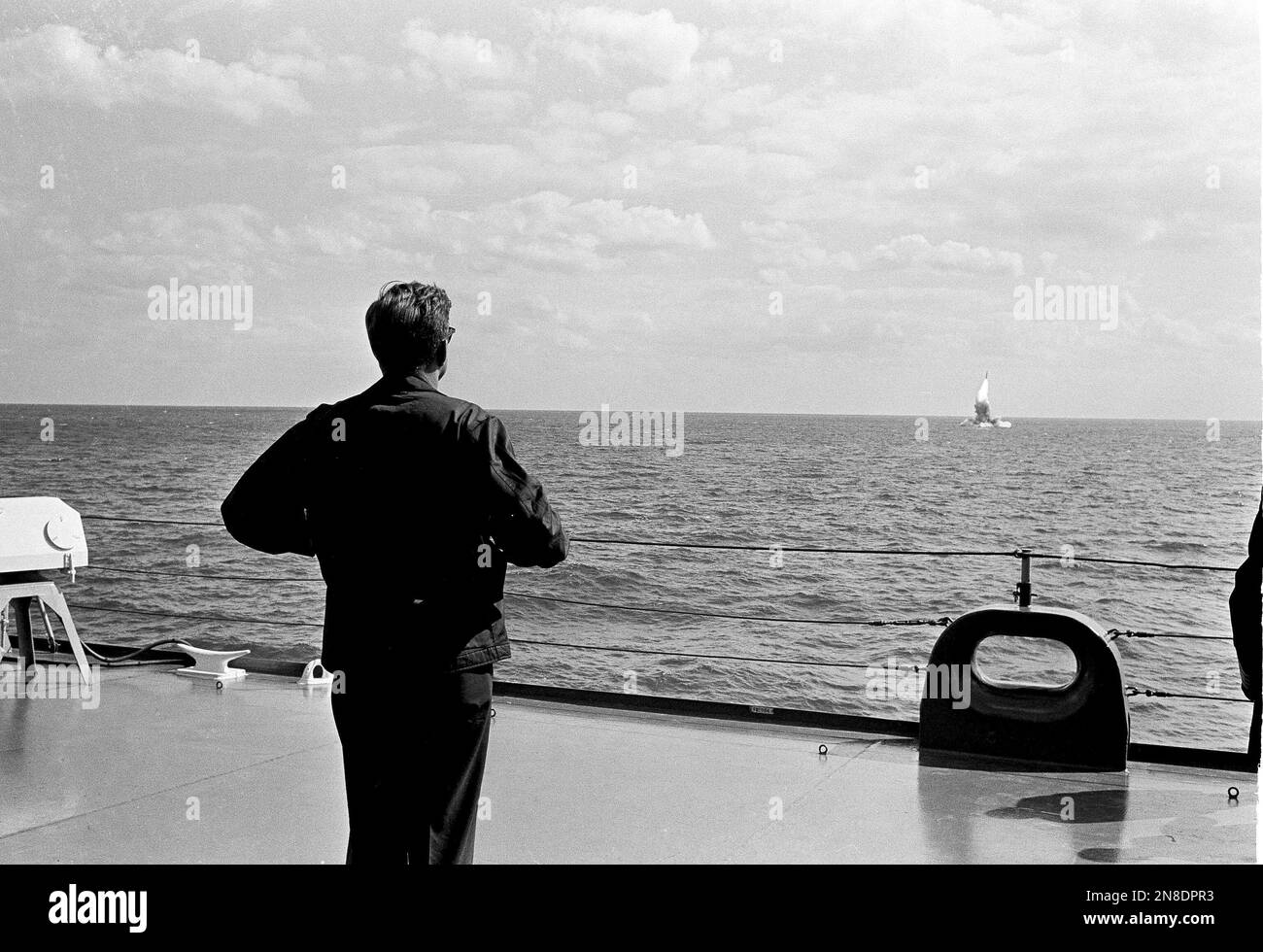 President John F. Kennedy, wearing a windbreaker, watches as a Polaris ...