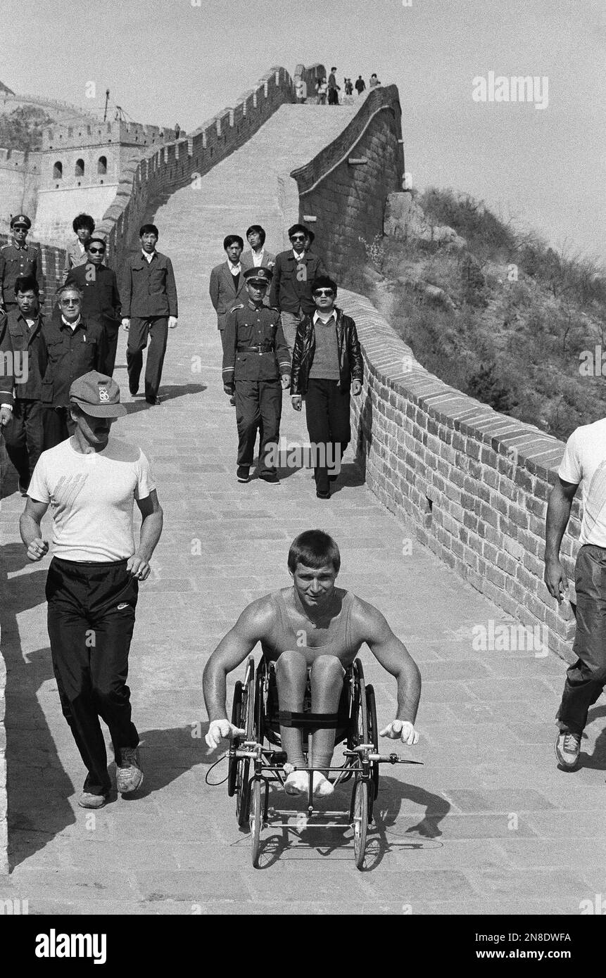 Canadian wheelchair Athlete Rick Hansen, a paraplegic, speeds down a ...