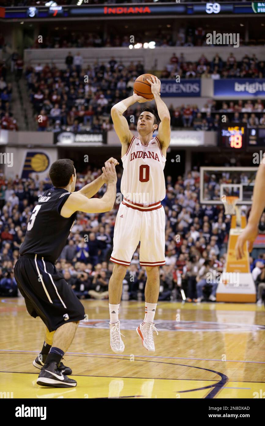 Indiana forward Will Sheehey, right, shoots over Butler guard Alex ...
