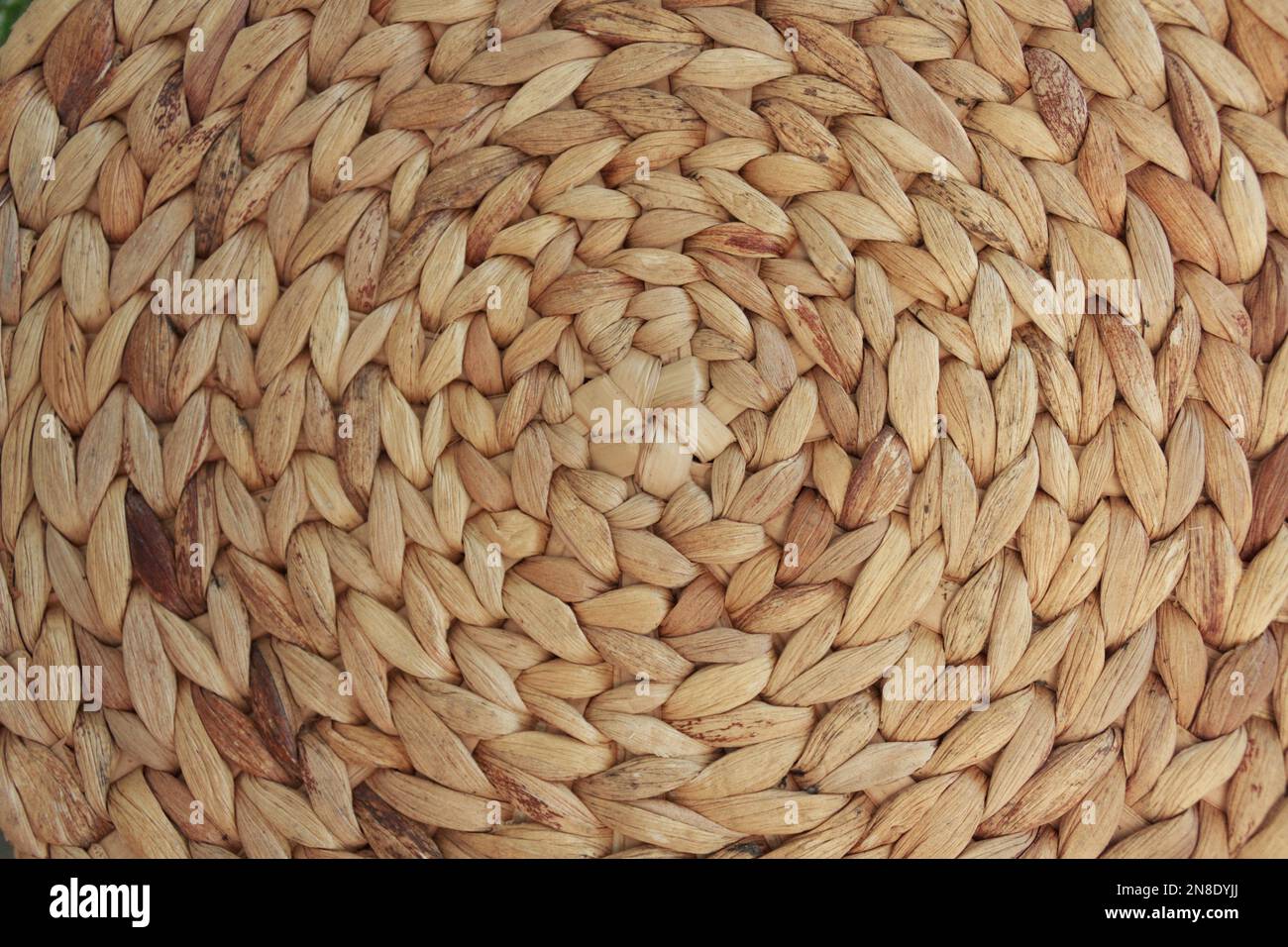 Texture of woven straw in round rows, background, abstraction Stock ...