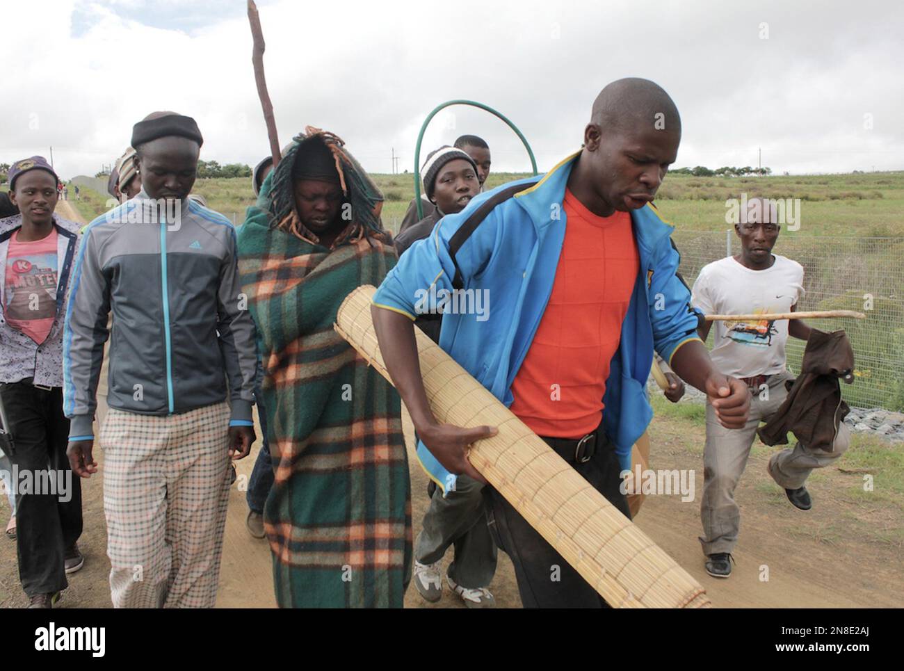 In this photo taken Sunday, Dec. 16 2012, Bambatha Mandela, covered in ...