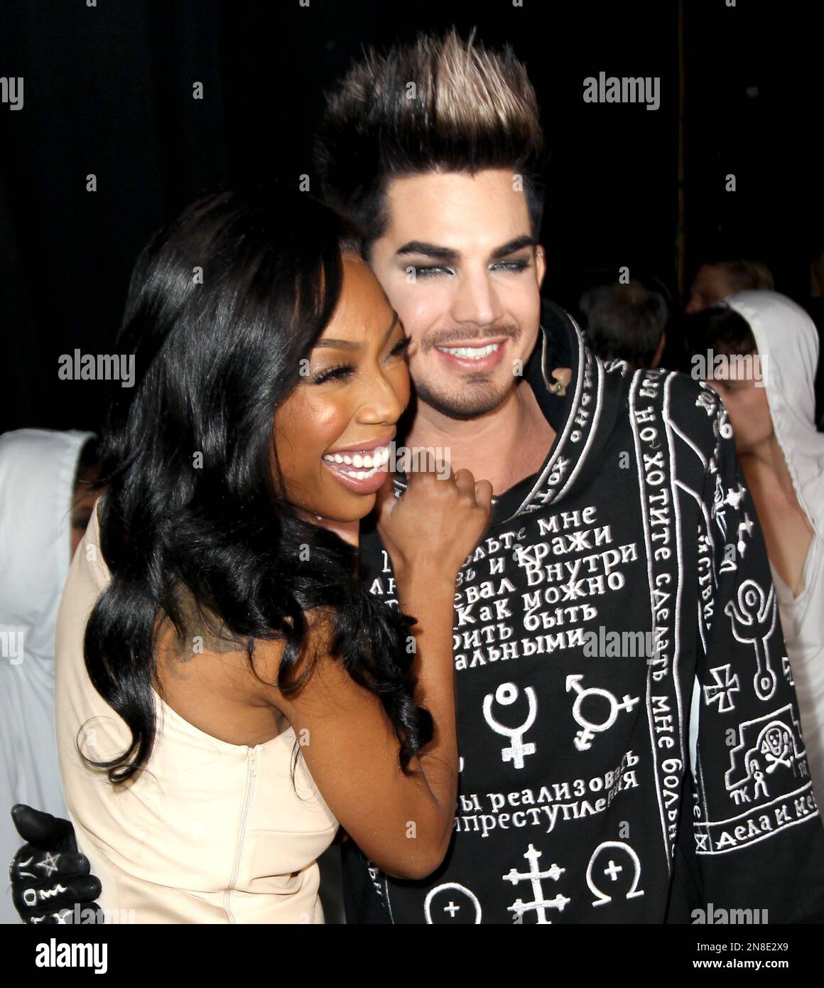 Brandy, left, and Adam Lambert are seen backstage at VH1 Divas on ...