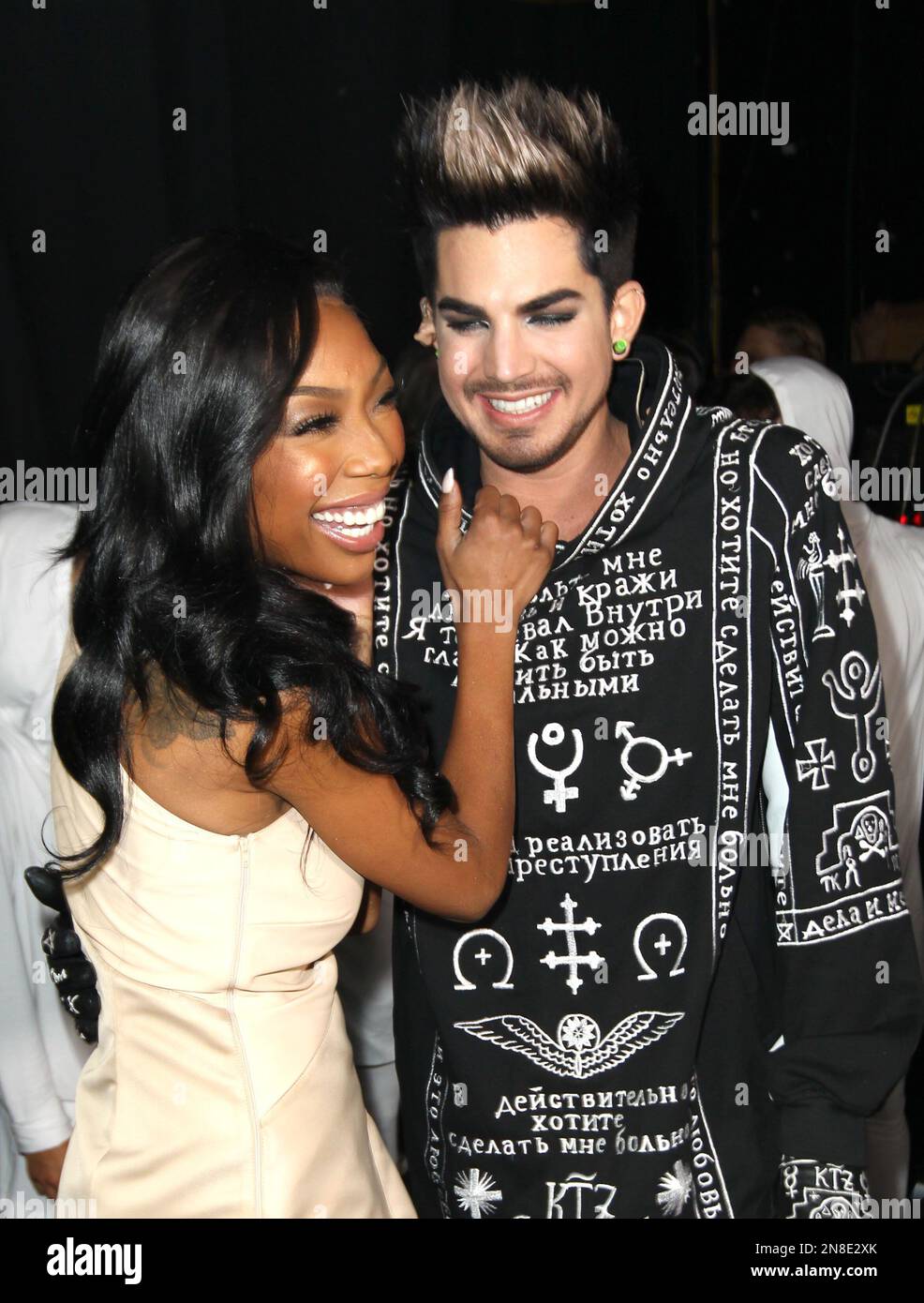 Brandy, left, and Adam Lambert are seen backstage at VH1 Divas on ...