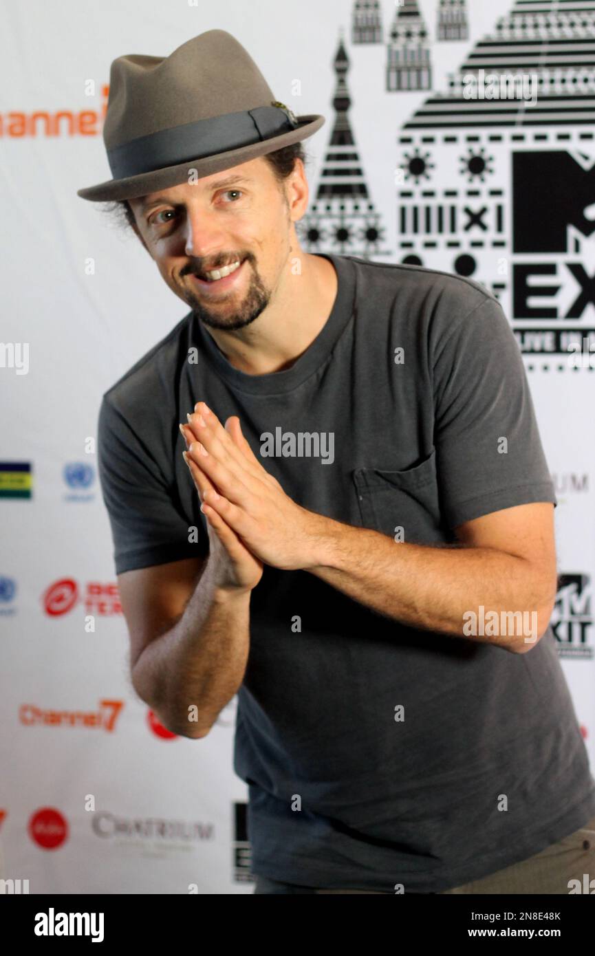 American singer-songwriter Jason Mraz gestures as he arrives before his ...