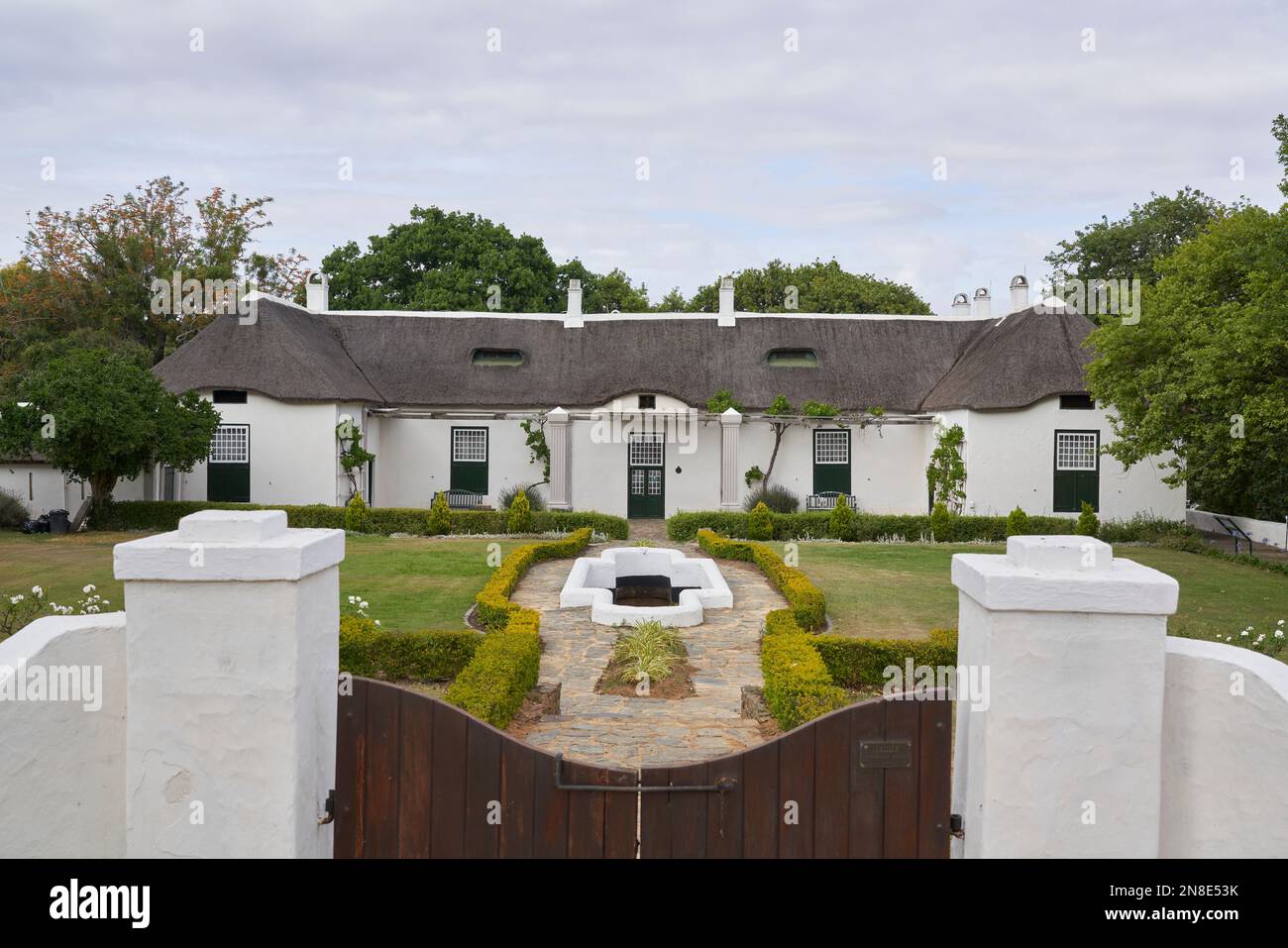 Historic buildings in the Cape Dutch style of architecture that form ...