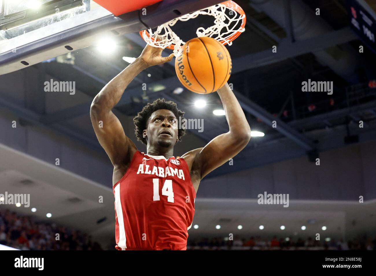Alabama center Charles Bediako (14) slam dunks the ball during the ...