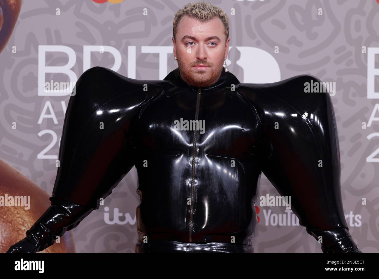 Sam Smith poses for photographers upon arrival at the Brit Awards 2023 ...