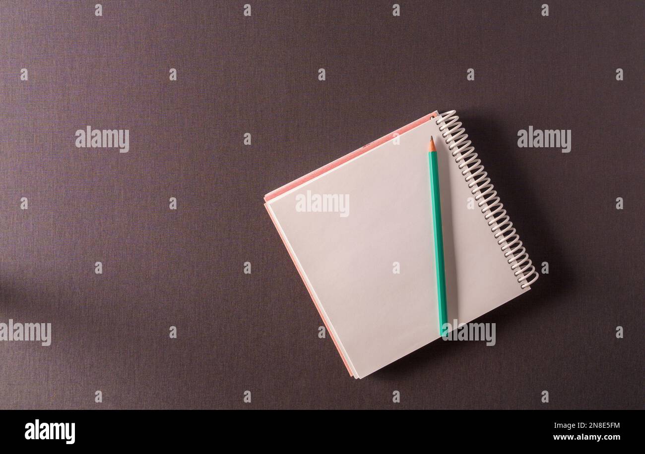 Mockup. An empty A4 notebook on gray background, top view Stock Photo ...
