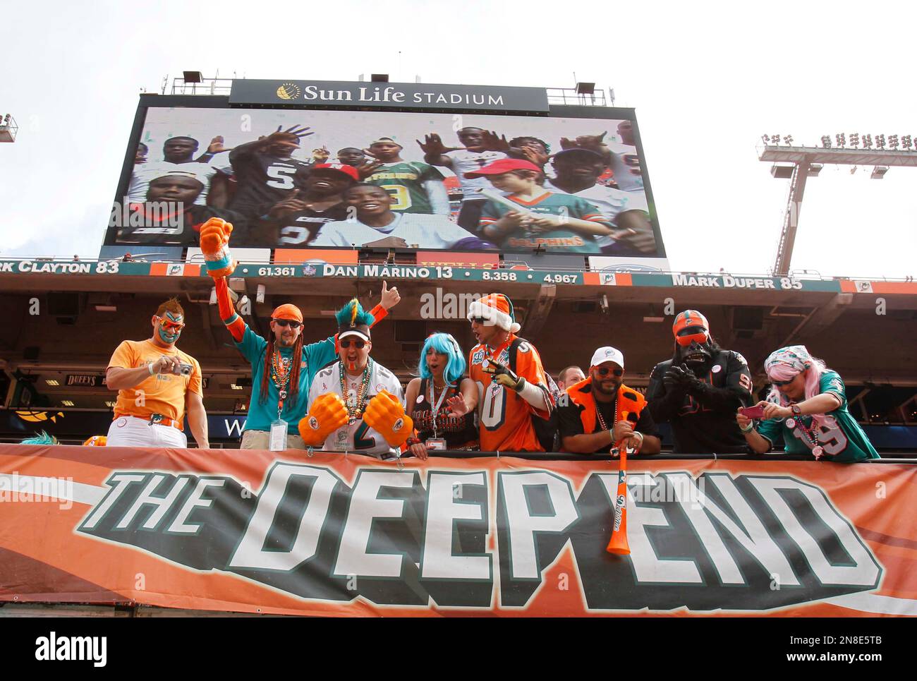 Miami Dolphins fans cheer during the second half of an NFL football ...
