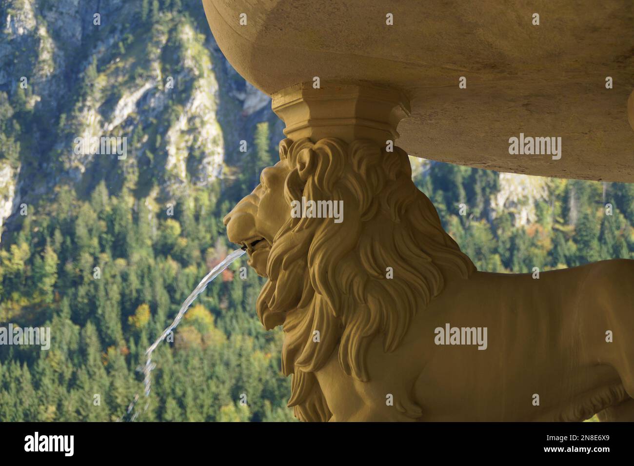 beautiful water fountain with royal Bavarian lions in the garden of ...
