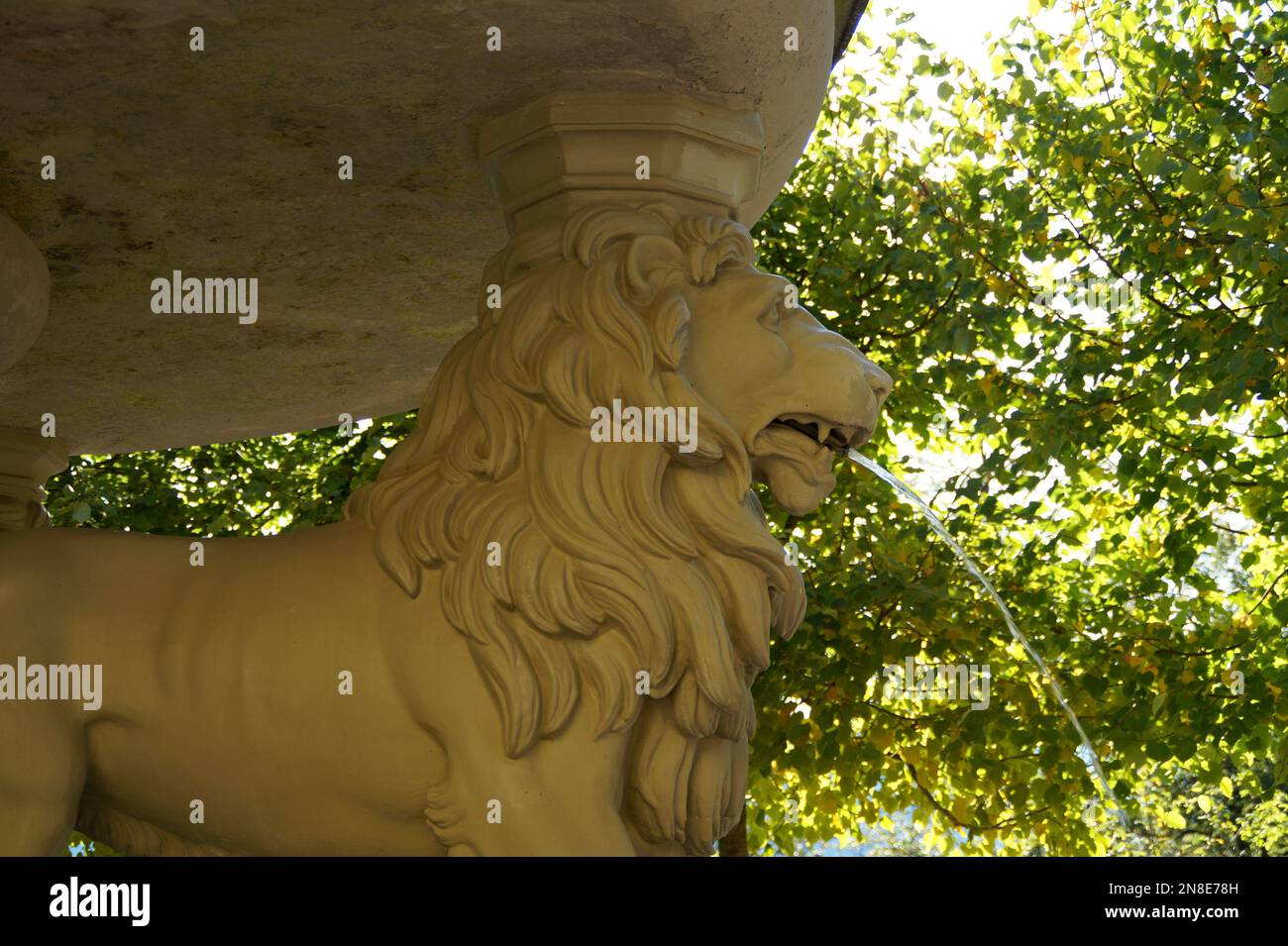 beautiful water fountain with royal Bavarian lions in the garden of ...