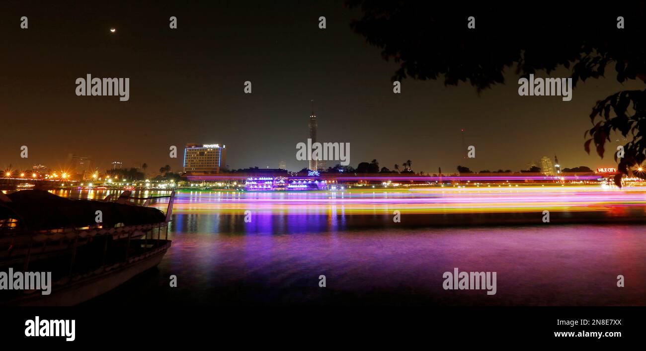 Boats float on the Nile river in Cairo, Egypt, Sunday, Dec. 16, 2012 ...