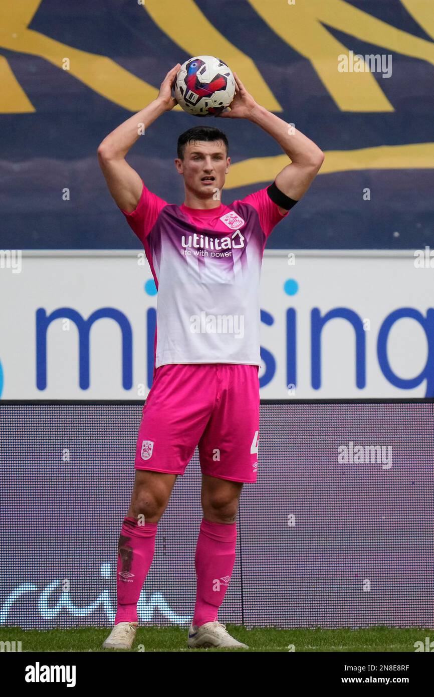 Matty Pearson #4 of Huddersfield Town sets to take a throw in during ...