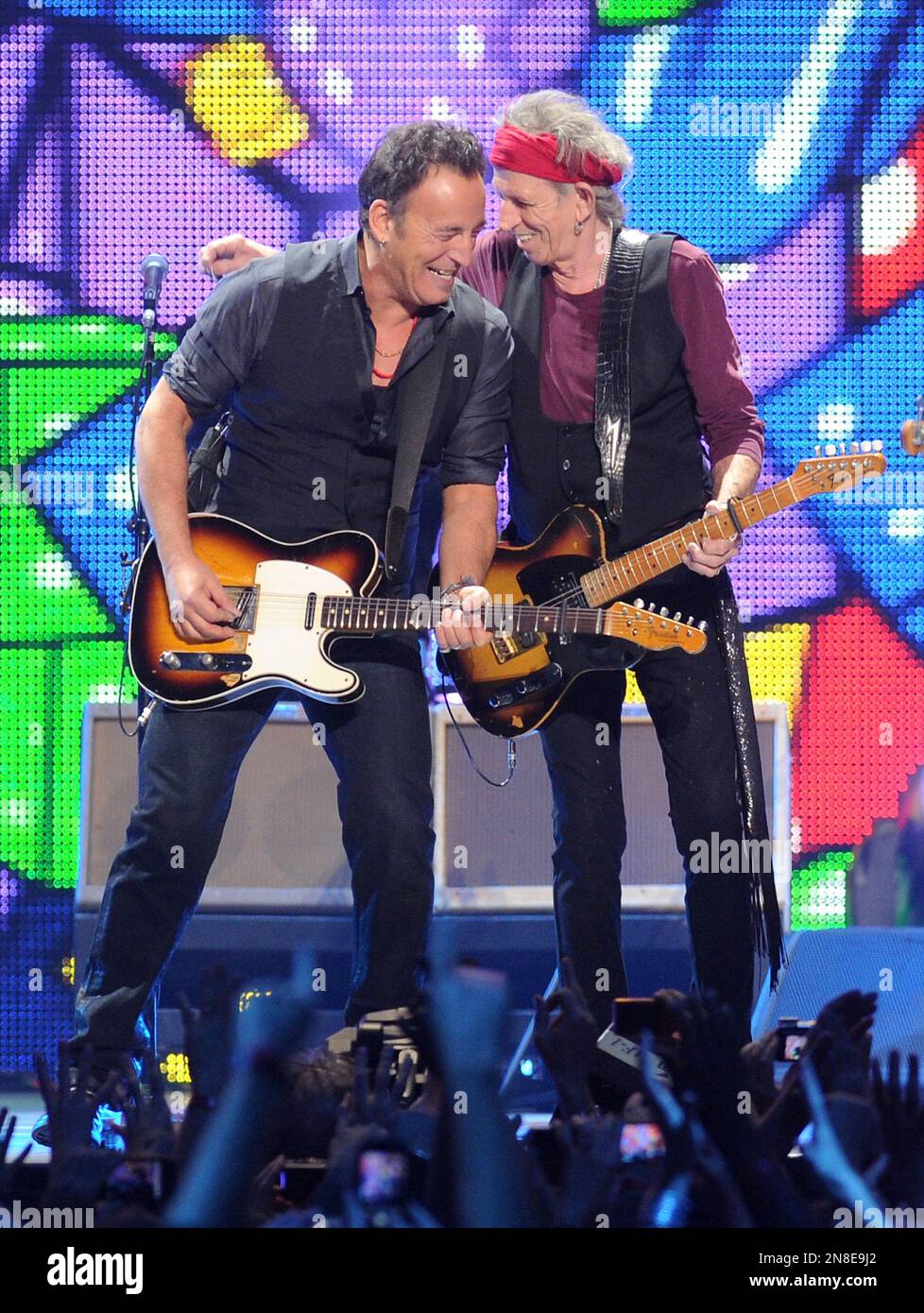 Musician Bruce Springsteen, left, performs with Keith Richards of The ...