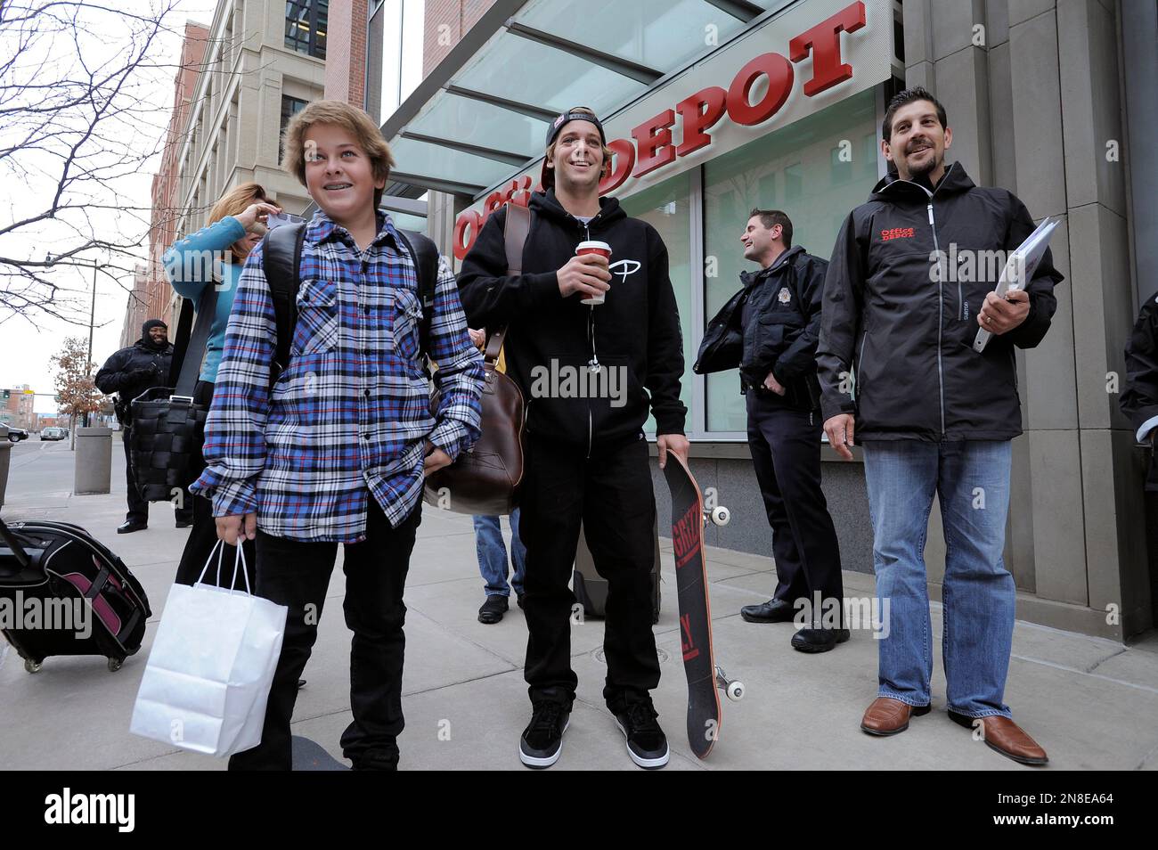 Ryan Sheckler , second from left, and his brother Kane, arrive to sign ...