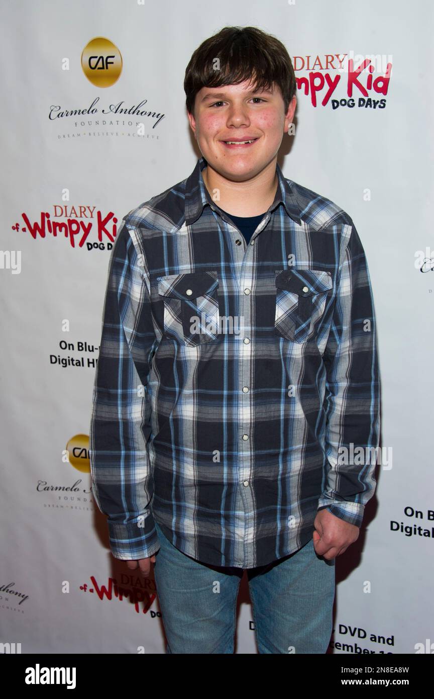 Actor Robert Capron poses on the red carpet to celebrate the "Diary of ...