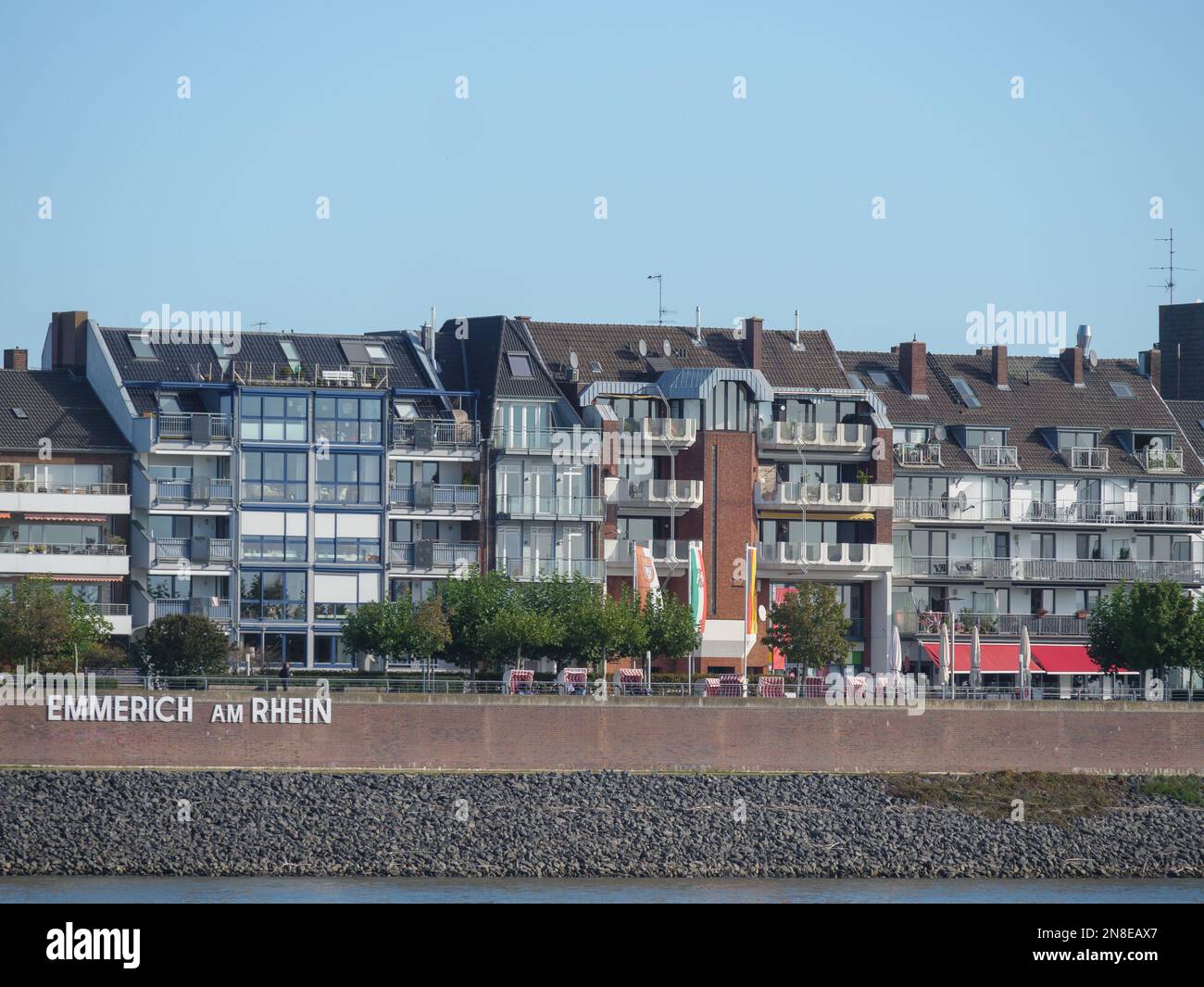 The sign of Emmerich at the Rhine River and buildings in the background ...