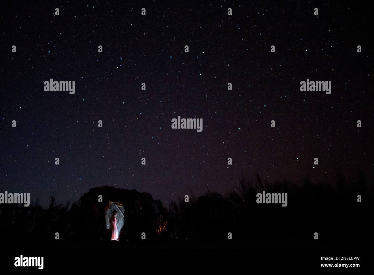In this Nov. 1, 2012 photo, stars fill the sky as seven-year-old Achta ...