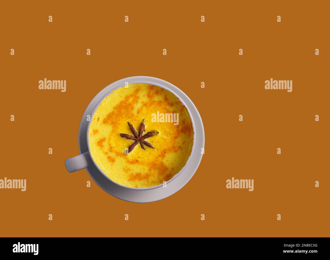 Flay lay Ayurvedic golden turmeric latte milk tea made with turmeric ...