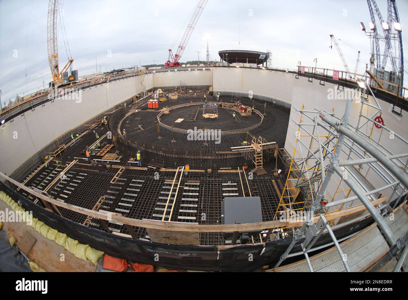 In this Tuesday, Dec. 11, 2012 photo, workers build the pit that will ...