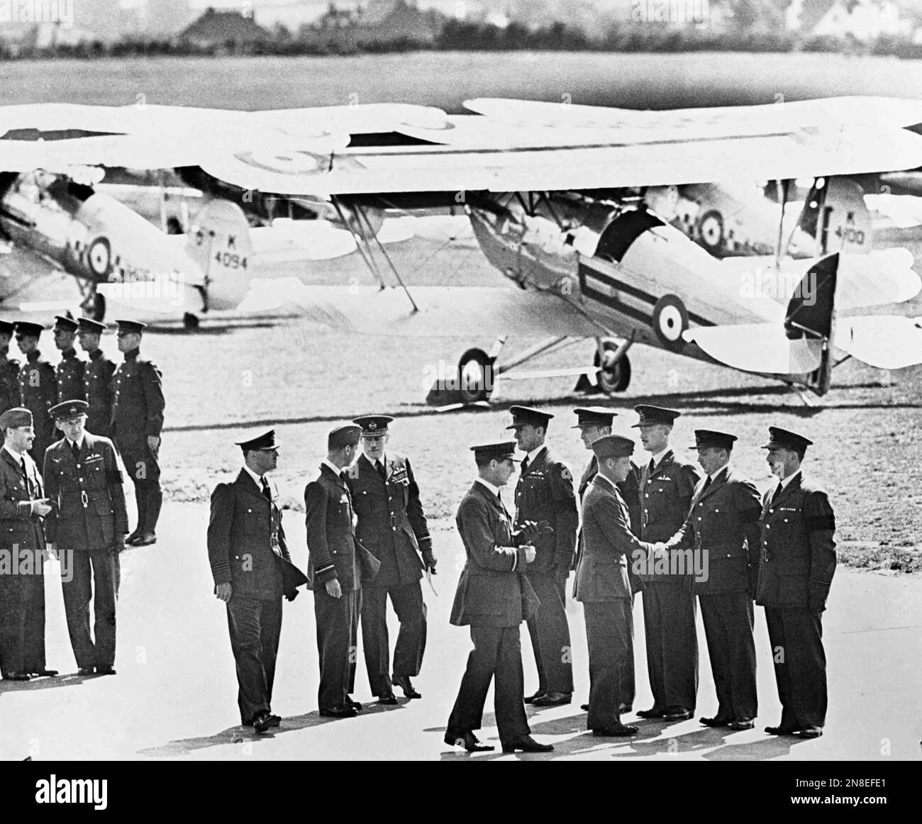 Britain's King Edward VIII, wearing the new Royal Air Force hat ...