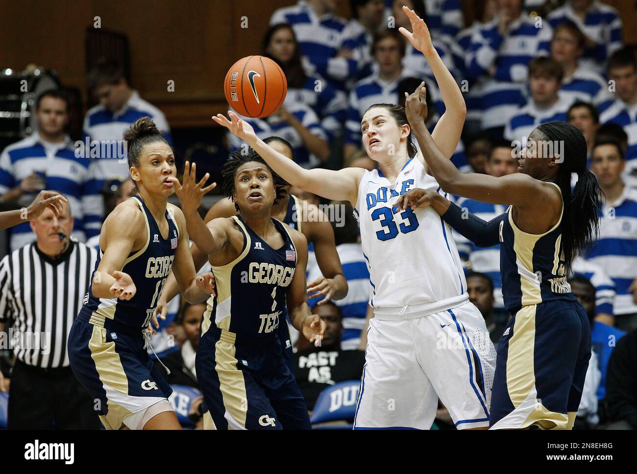 Duke's Haley Peters (33) struggles for a rebound with Georgia Tech's ...