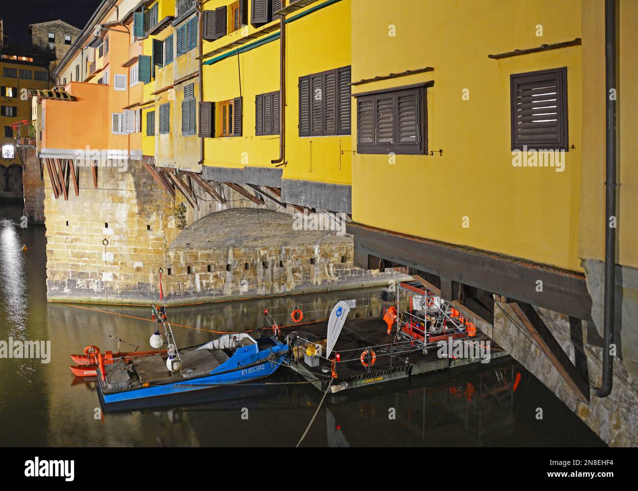Ponte Vecchio is a medieval stone bridge with shops. Shooting in ...