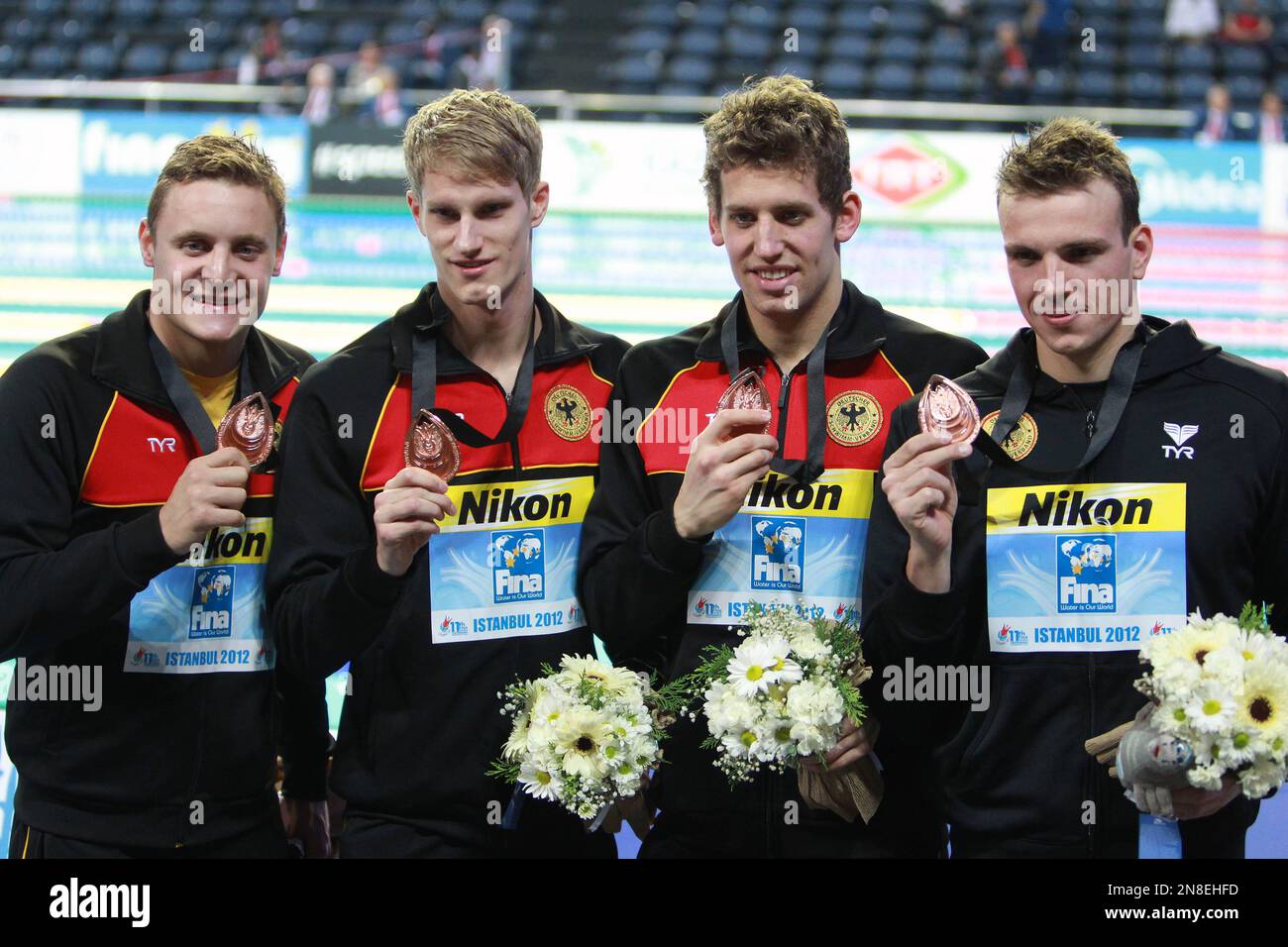 Germany's swimmers of 4x200 meters freestyle pose with their bronze ...