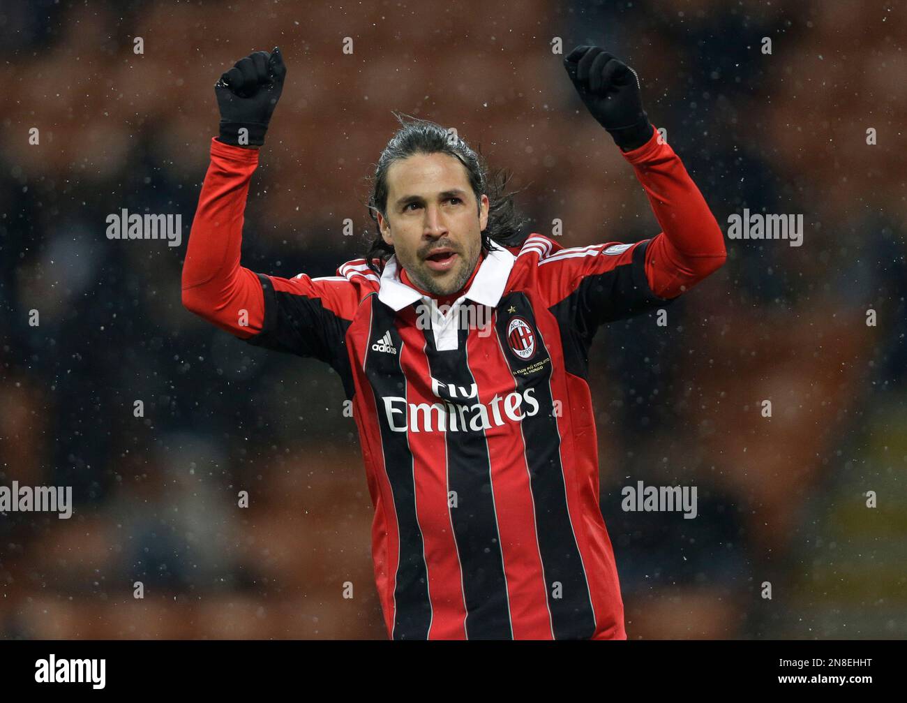 AC Milan defender Mario Yepes, of Colombia, celebrates after scoring ...