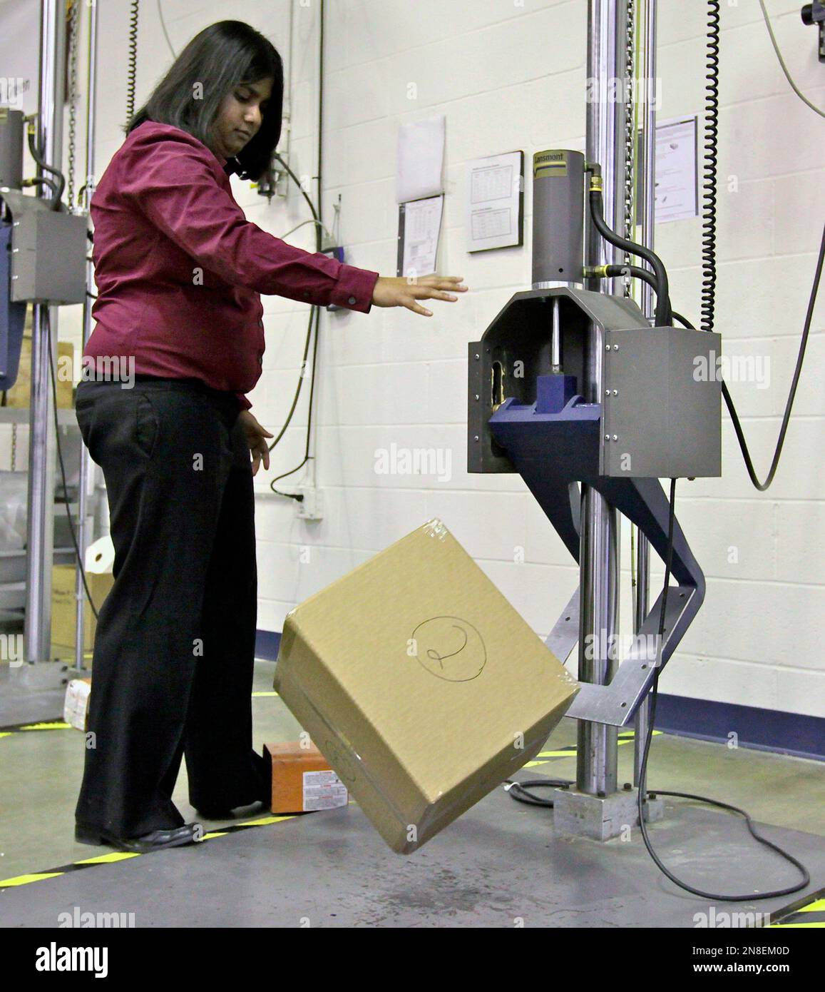 In this Dec. 11, 2012, photo, UPS packaging engineer Preeti Agrawal ...
