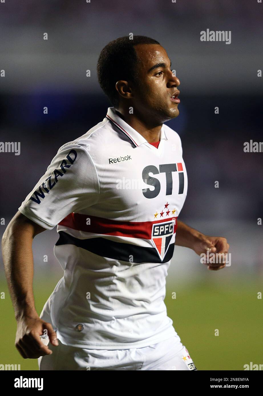 Brazil's Sao Paulo FC's Lucas, left, celebrates after scoring against ...