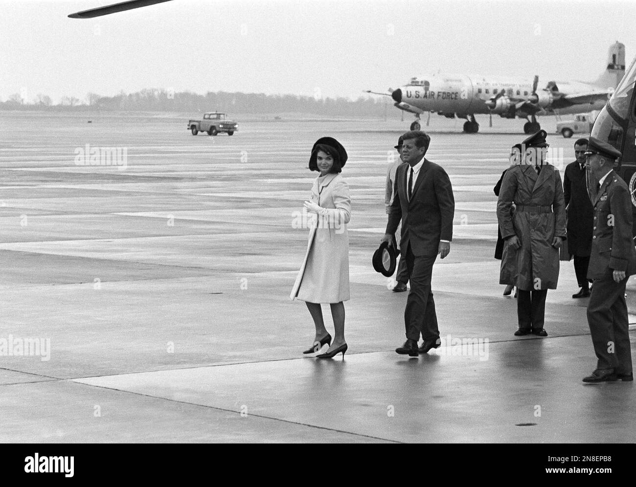 President John F. Kennedy and first lady Jacqueline Kennedy walk ...
