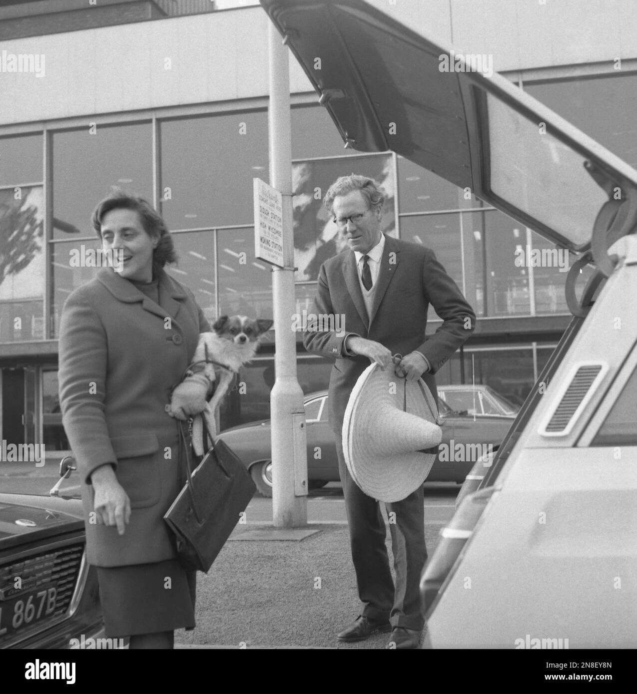 Carrying a souvenir hat from his visit Doctor Griffith Pugh, who has ...