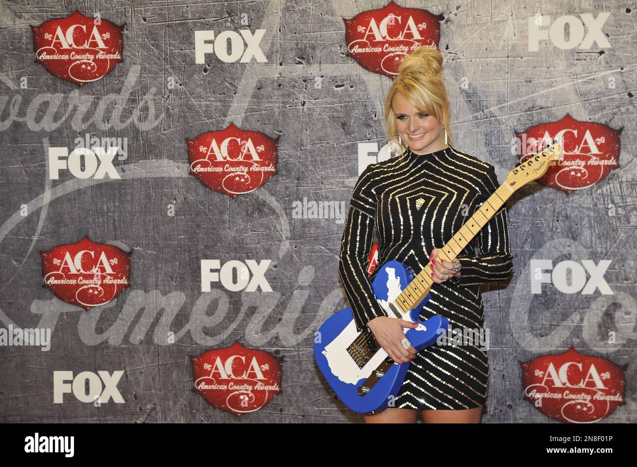 Recording artist Miranda Lambert poses in the press room with her award ...