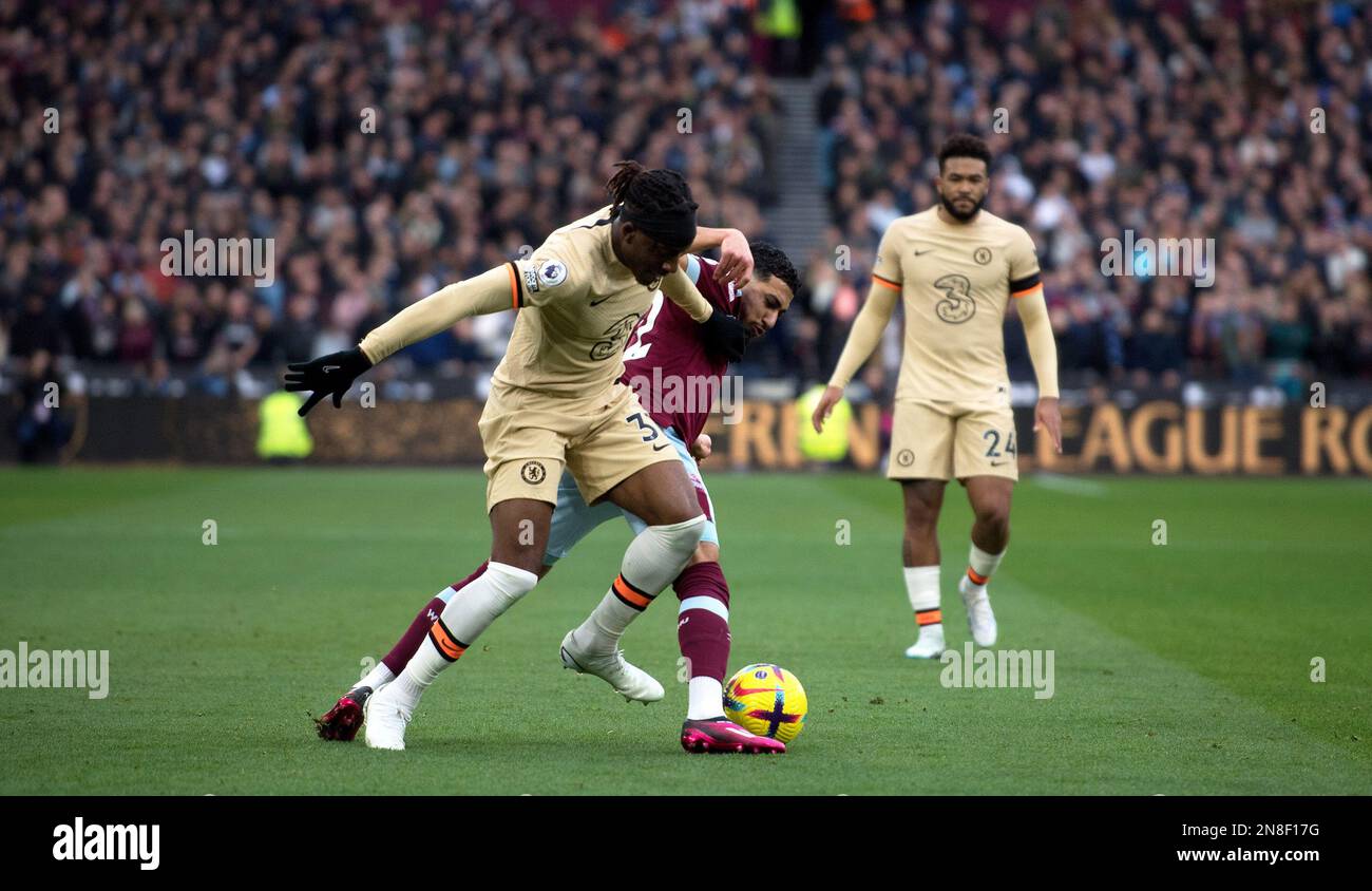 London, UK. 11th Feb, 2023. Noni Madueke of Chelsea and Said Benrahma ...