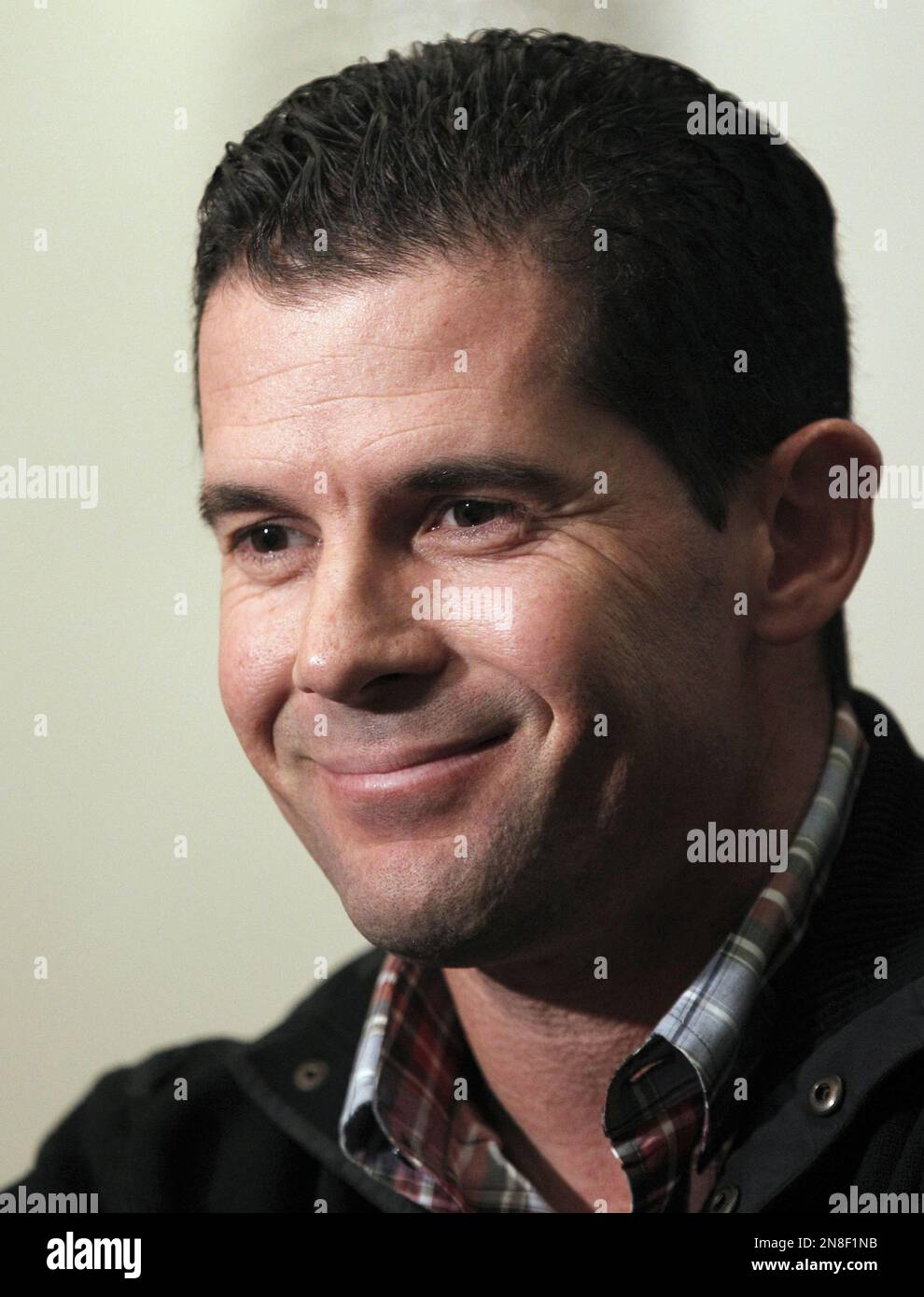 New Philadelphia Phillies third baseman Michael Young smiles during a ...