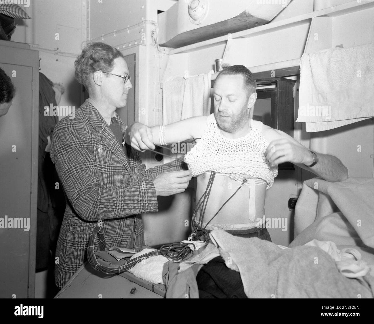 Doctor Griffith Pugh, left, a physiologist with the HMS "Vengeance ...