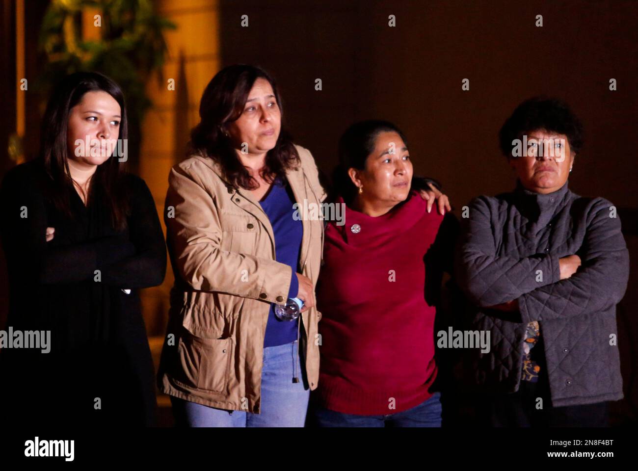 Ramona Rivera, center left, wife of Pastor Pedro Rivera Jr., center ...