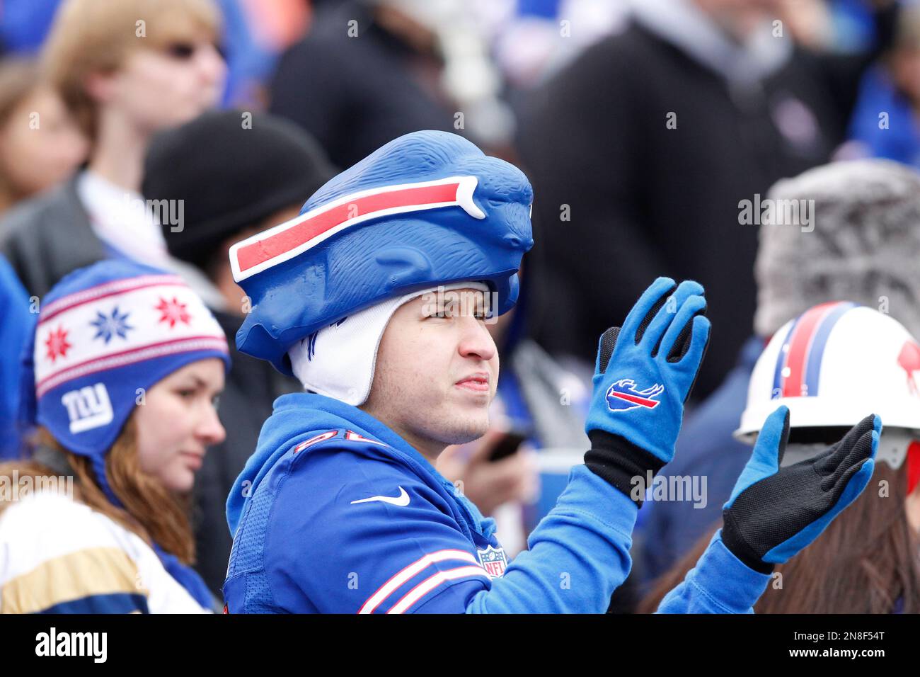 A Buffalo Bills fan cheers during the first half of an NFL football ...