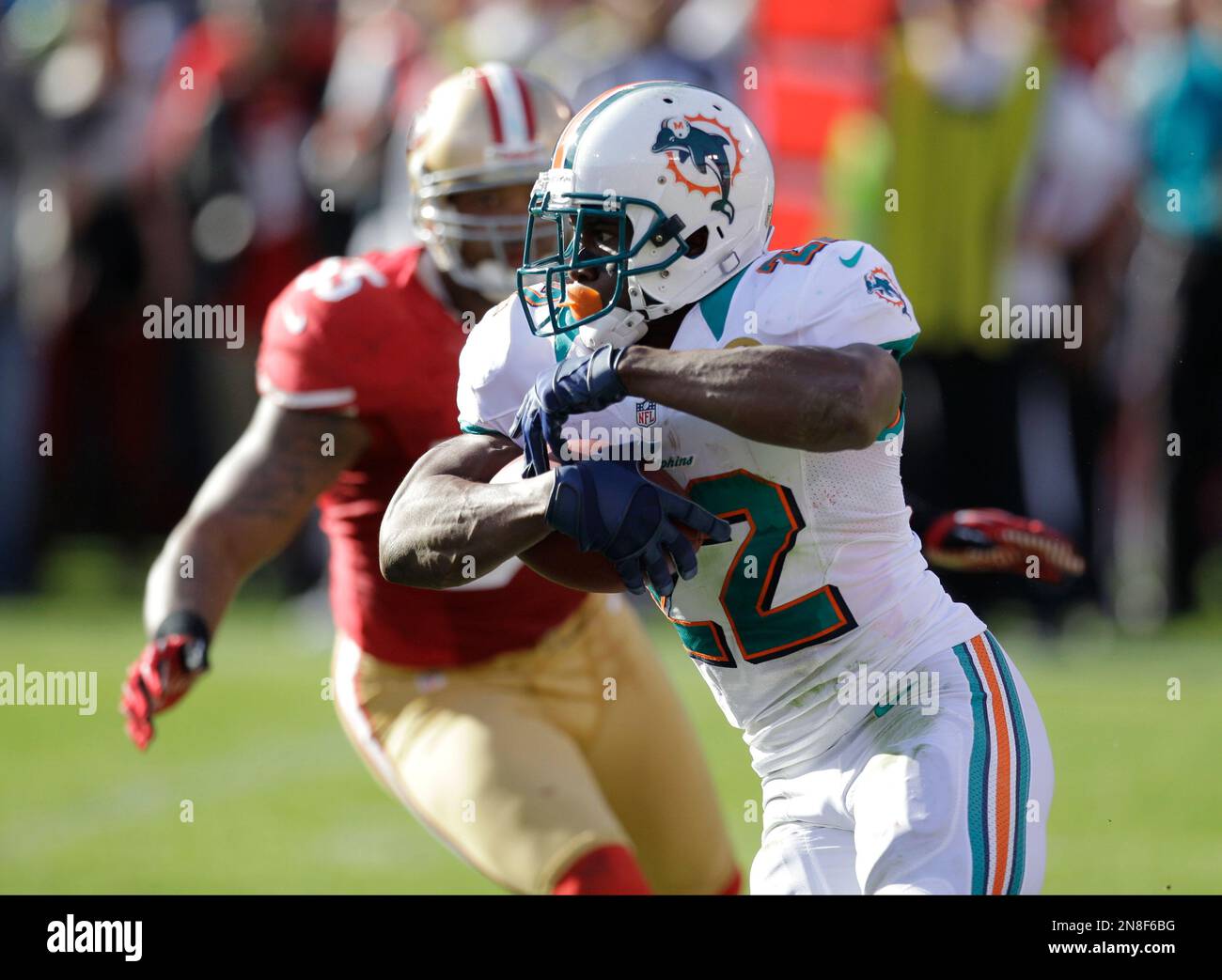 Miami Dolphins running back Reggie Bush carries the ball during the ...