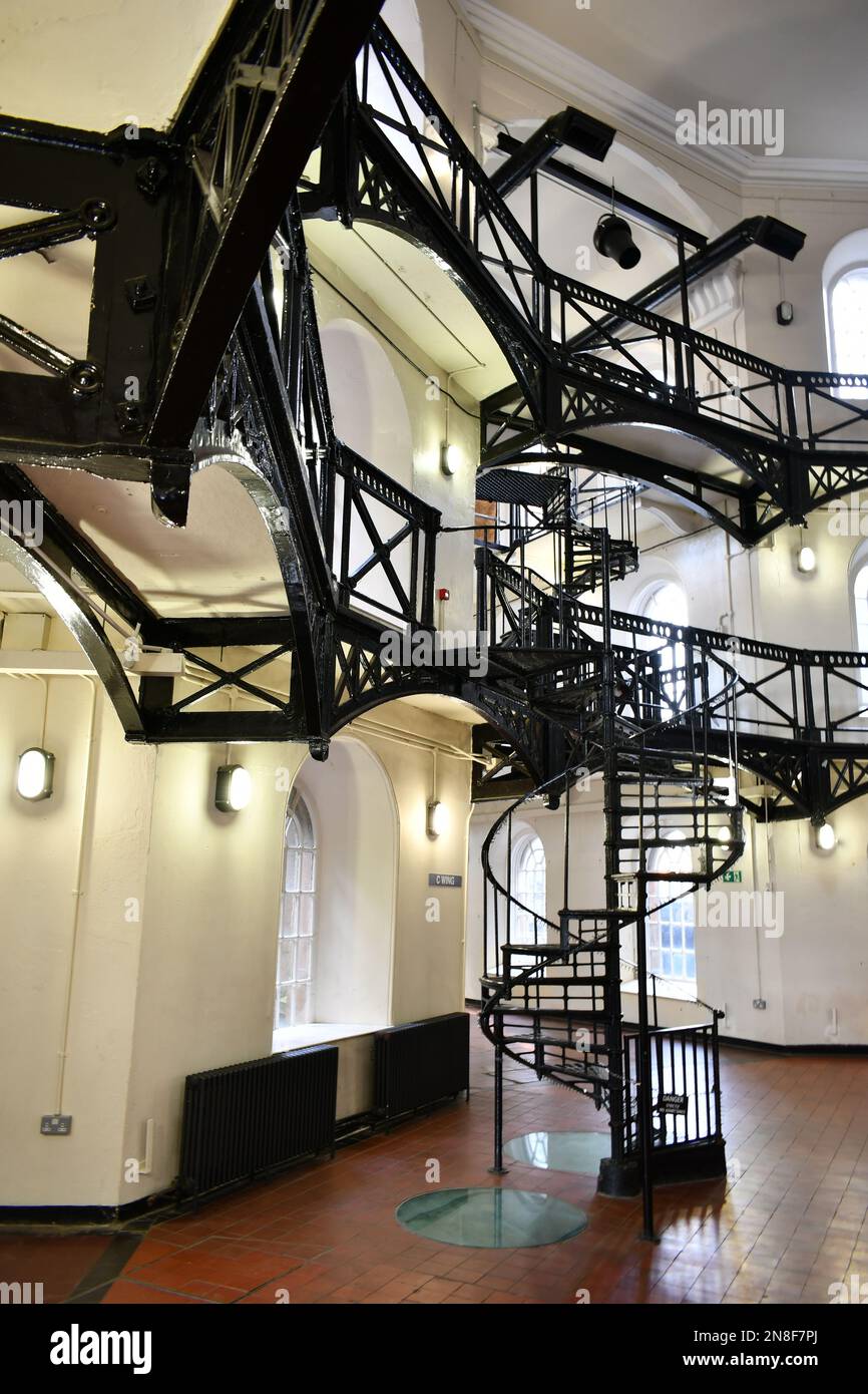 A vertical shot of Crumlin Road Gaol interior iron work Stock Photo - Alamy