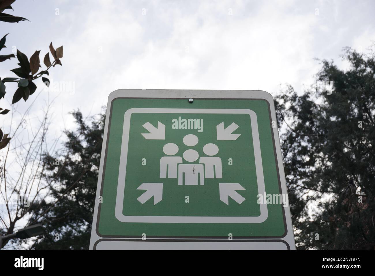 emergency assembly area sign, white shapes on green background Stock ...