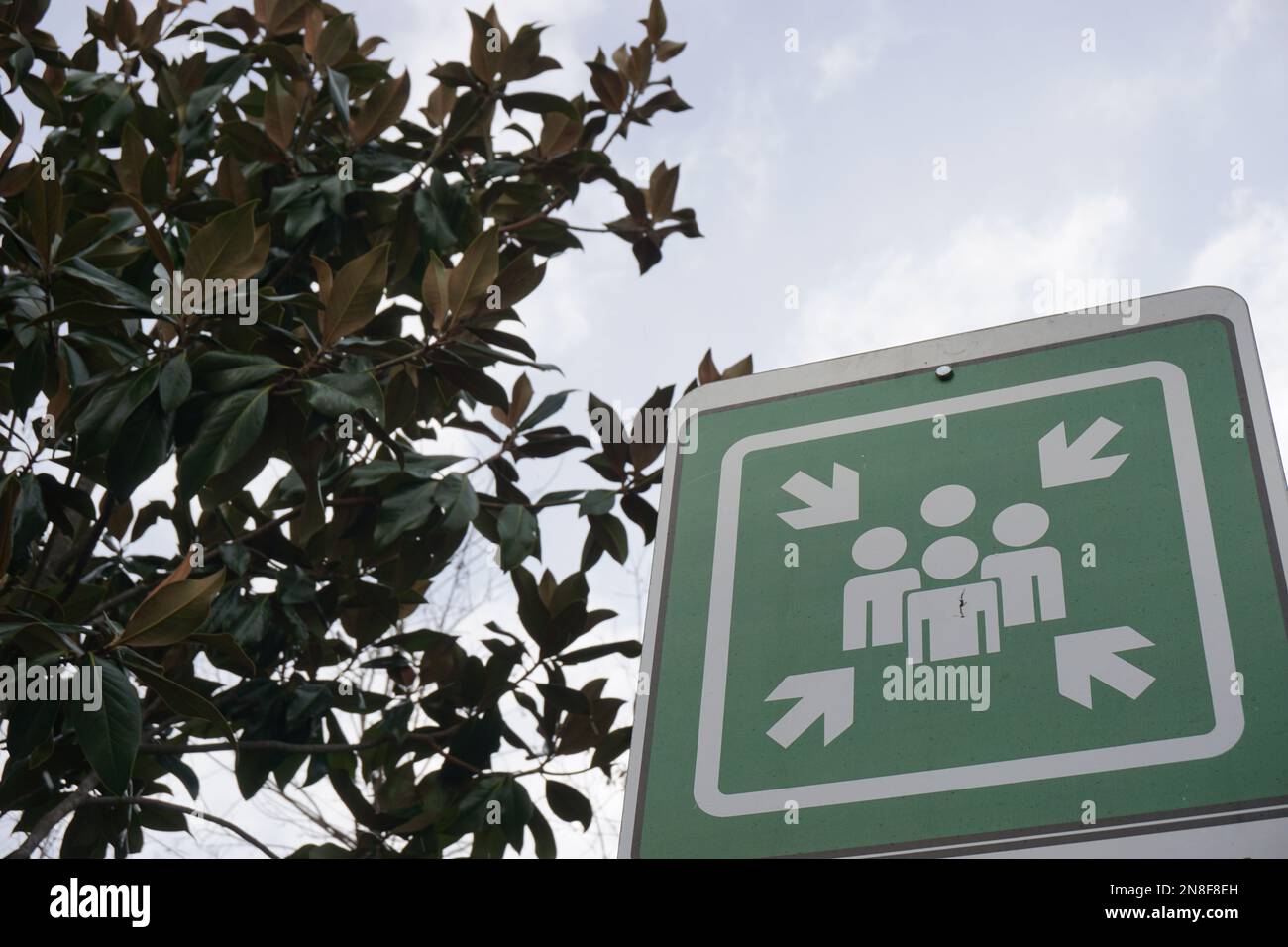 emergency assembly area sign, white shapes on green background Stock ...