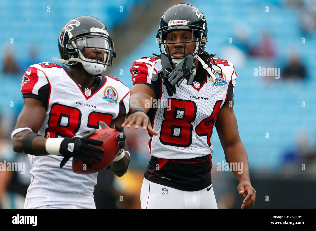 Atlanta Falcons' Roddy White (84) and Harry Douglas (83) joke as they ...