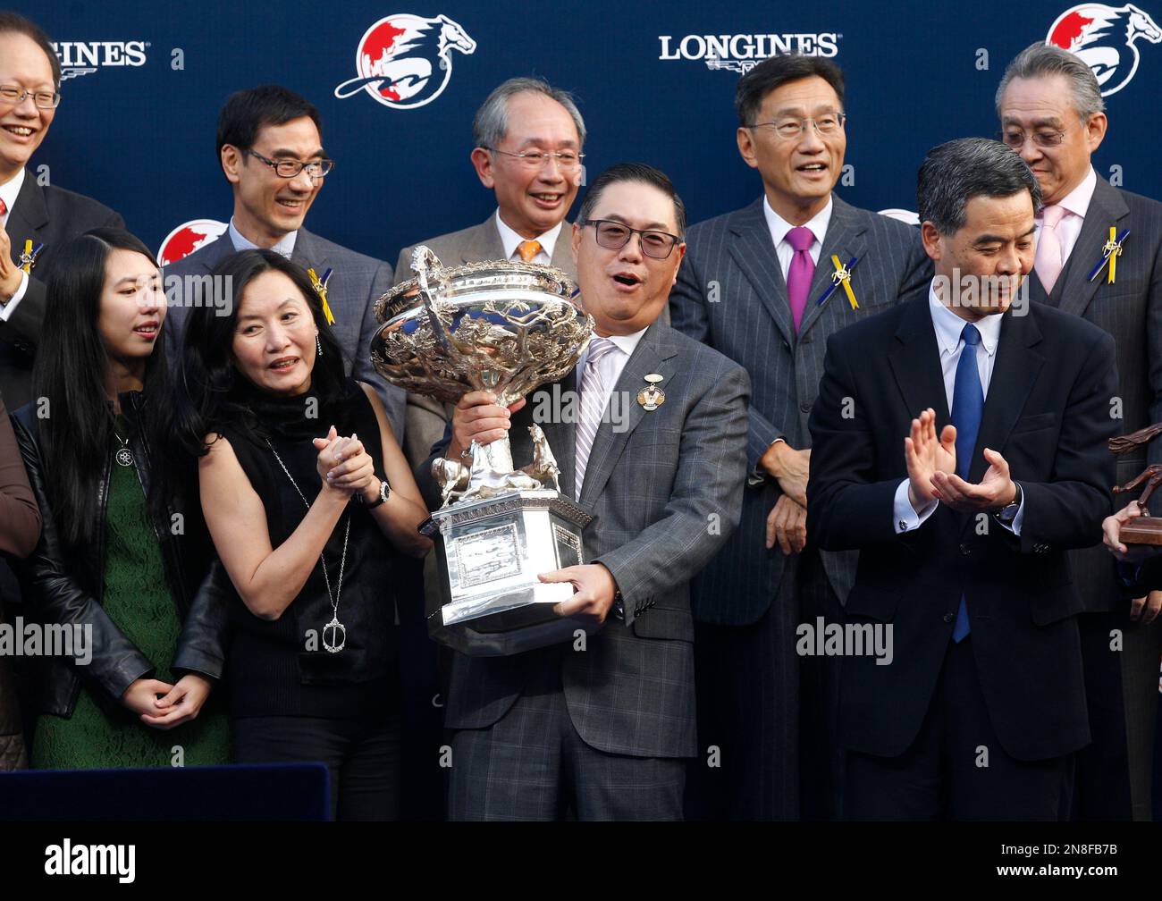 Howard Liang Yum-shing, center, owner of Hong Kong horse California ...