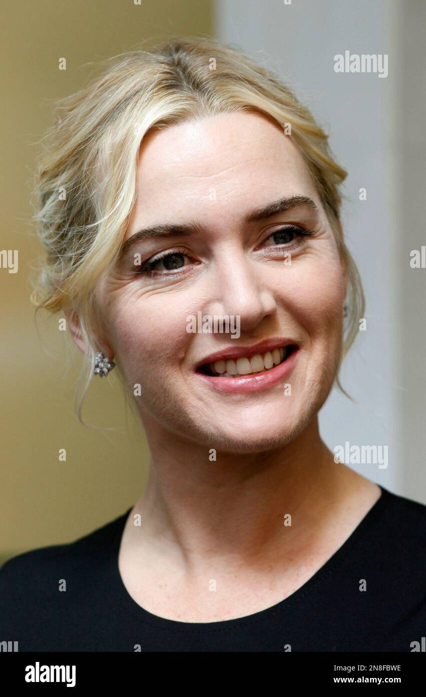 British actress Kate Winslet smiles while attending the opening of a ...