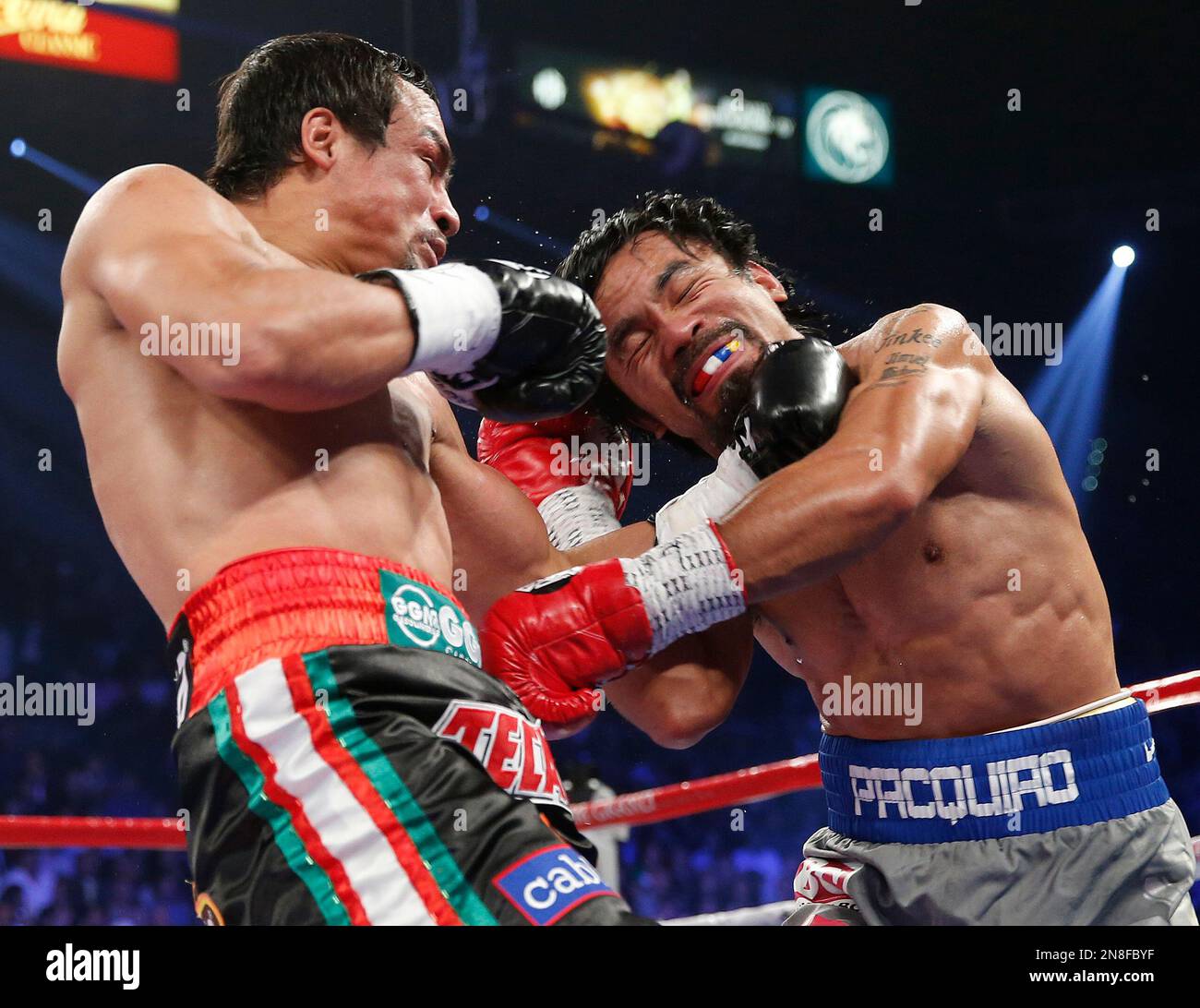 Juan Manuel Marquez, from Mexico, left, and Manny Pacquiao, from the ...