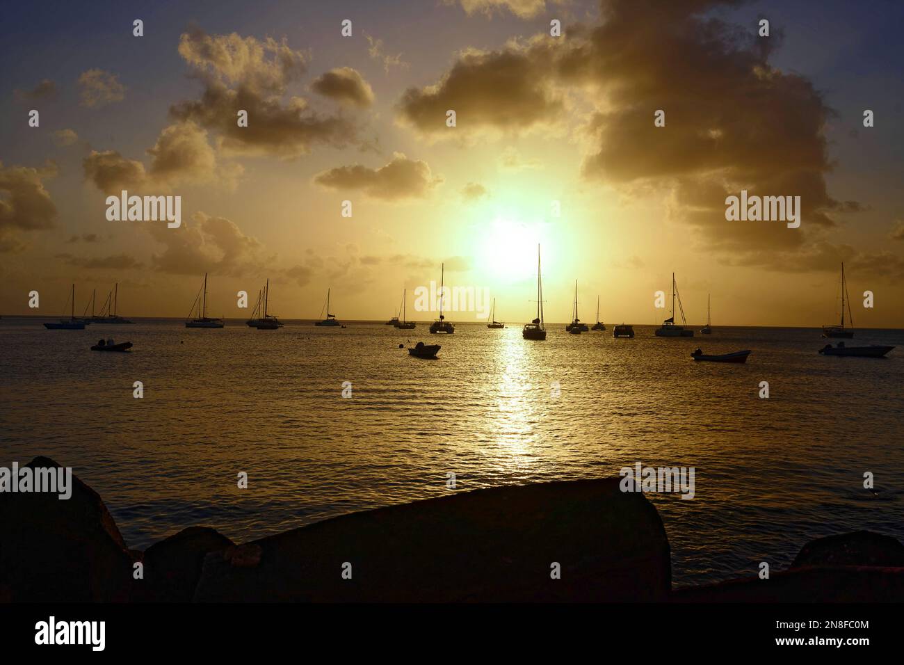 Colourful caribbean sunset with sailboats, Martinique island. French ...